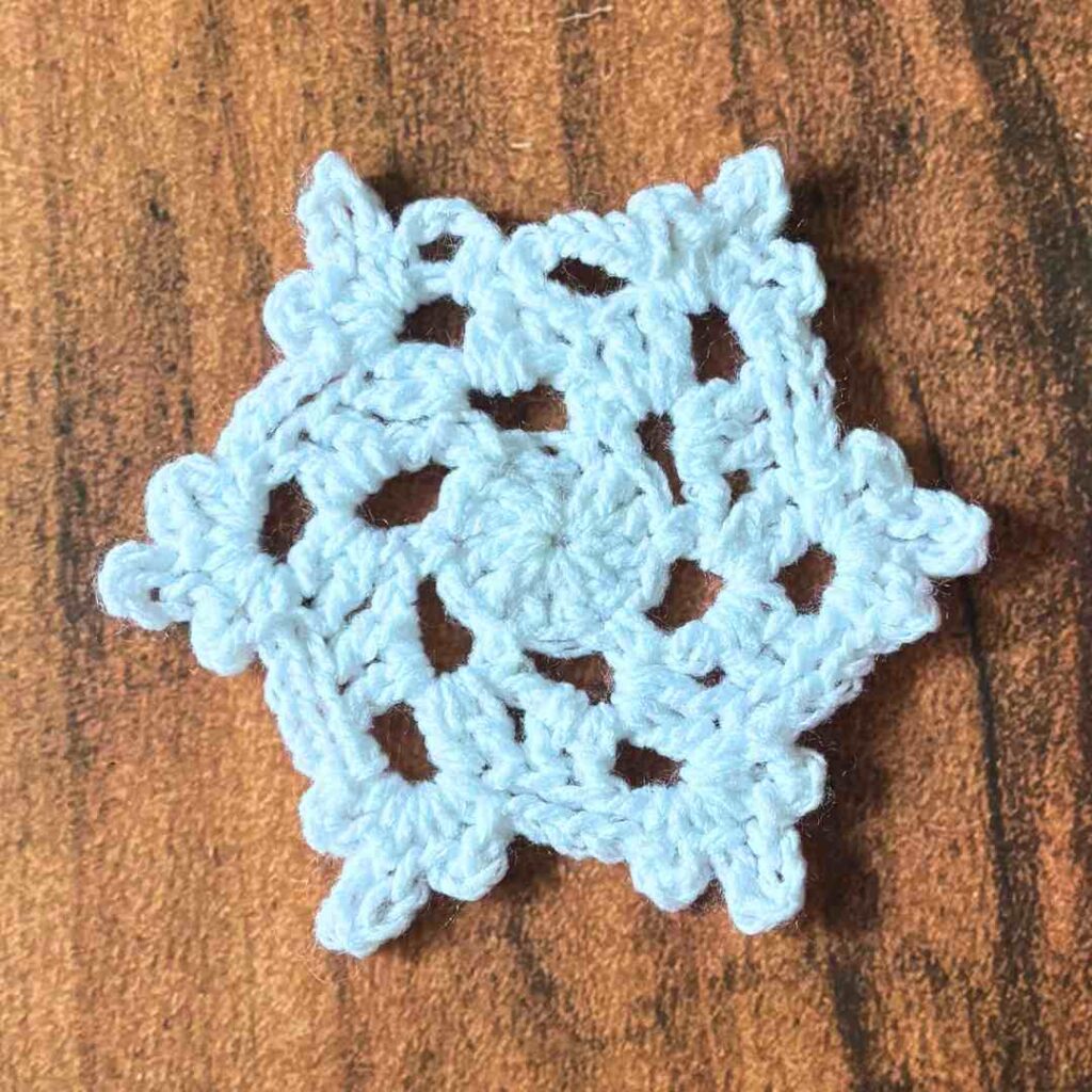 Turn Scrap Yarn Into Stunning Snowflake Coasters (Free Crochet Pattern)