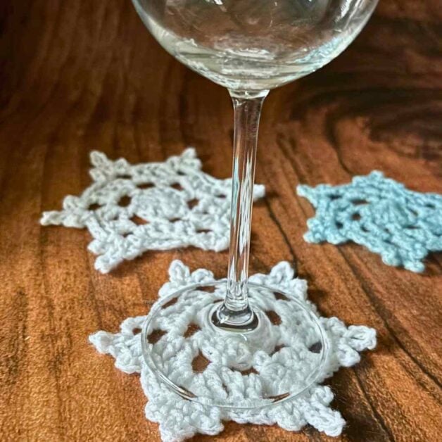 Turn Scrap Yarn Into Stunning Snowflake Coasters (Free Crochet Pattern)